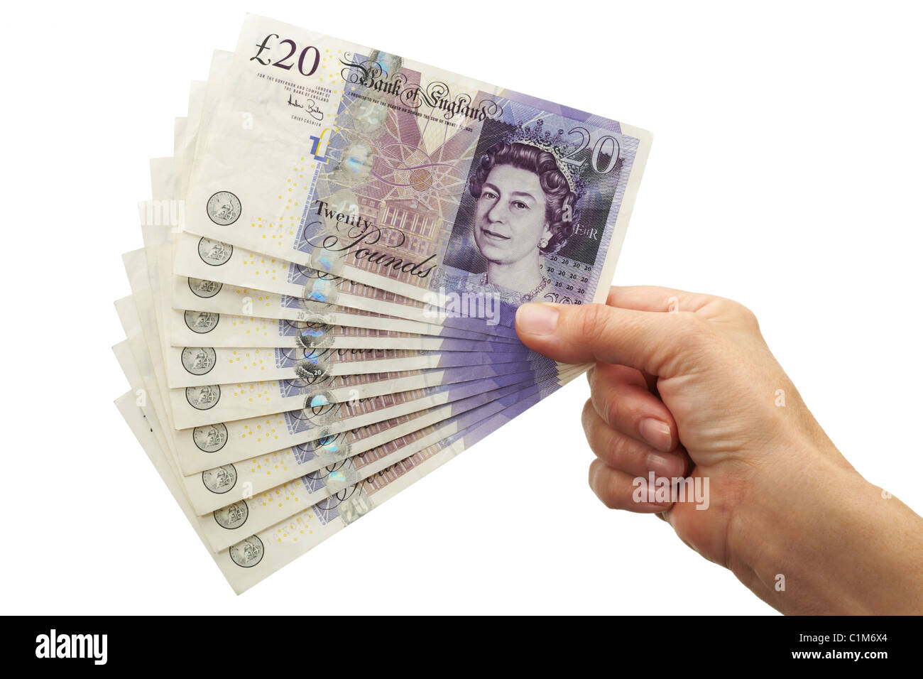 Fan of Twenty Pound Notes with Hand Stock Photo - Alamy