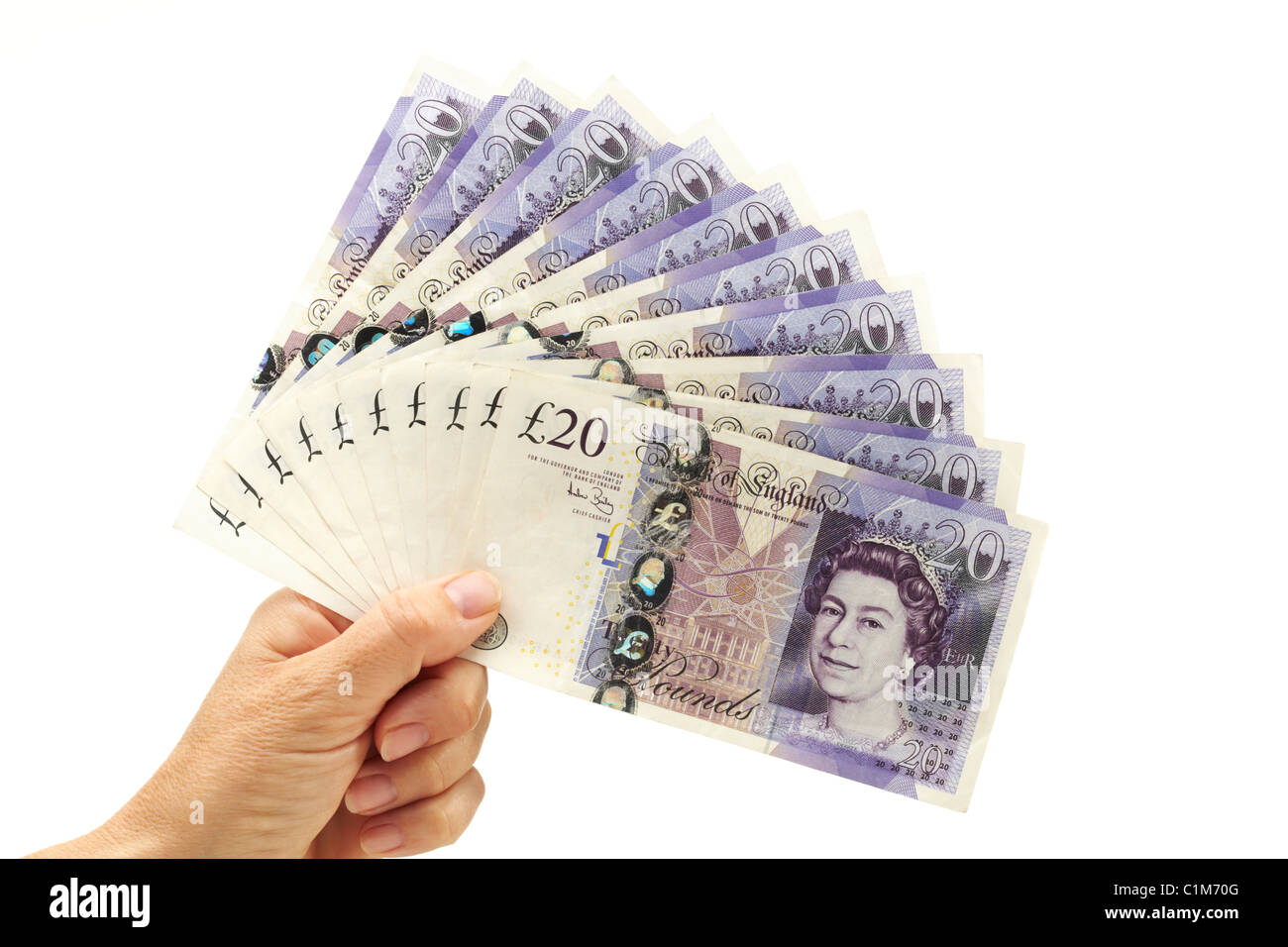 Fan of Twenty Pound Notes with Hand Stock Photo - Alamy