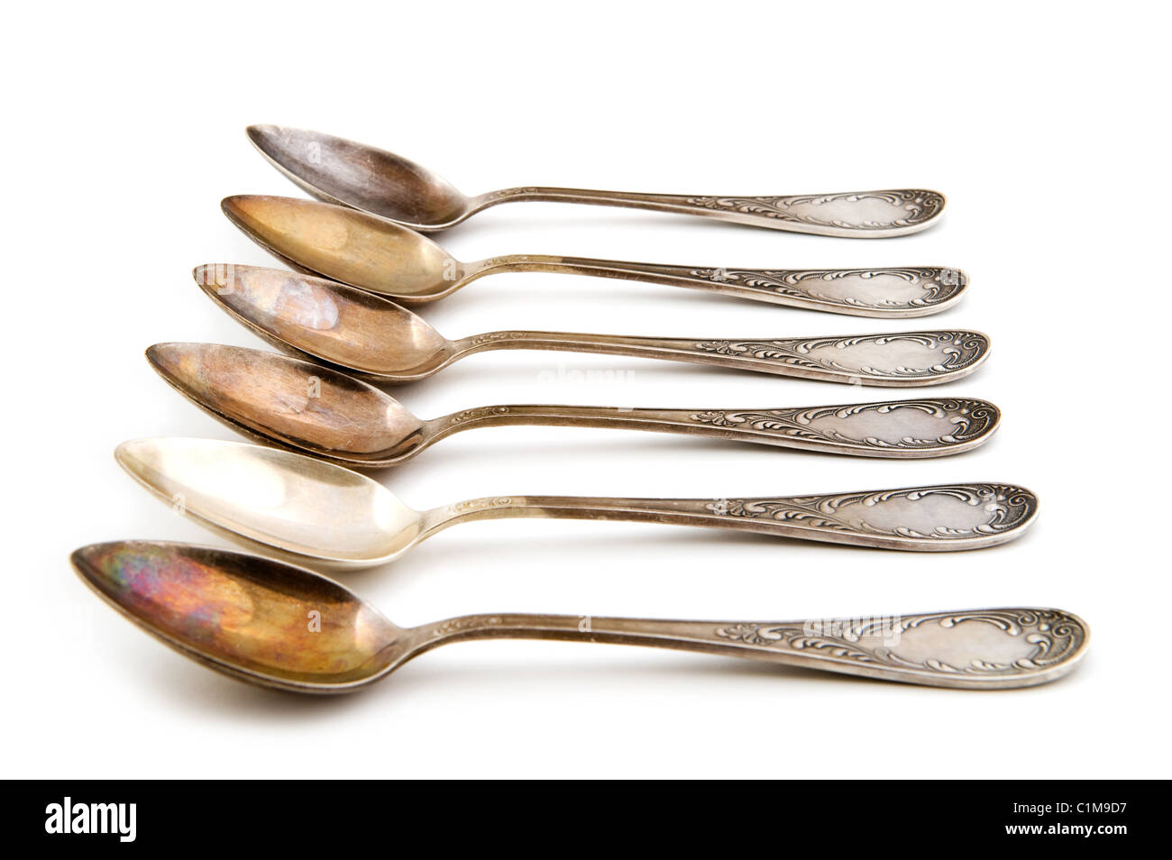 object on white - antique silver spoon Stock Photo - Alamy