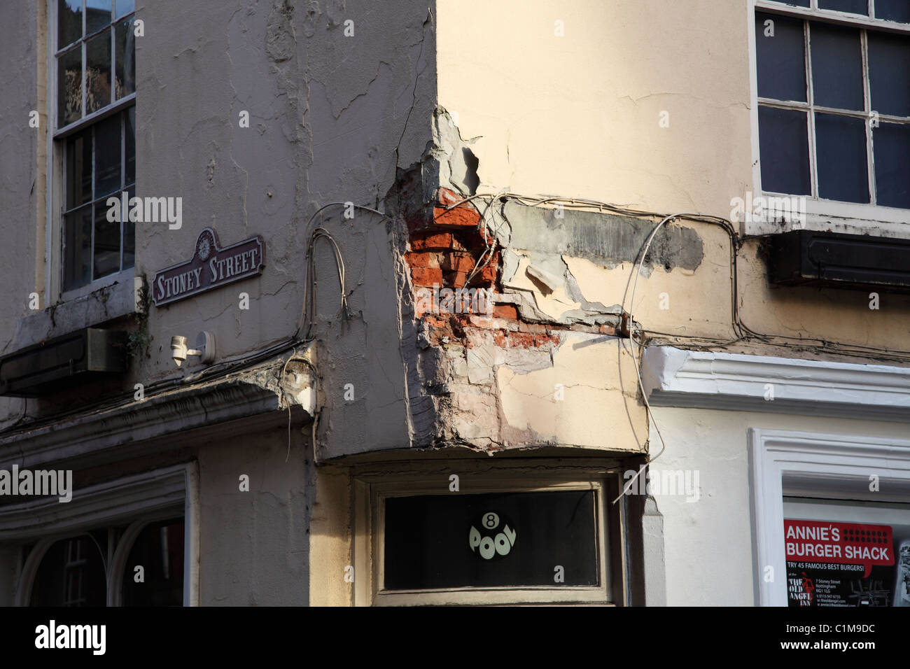 Damaged brickwork on a building in a U.K. city Stock Photo - Alamy