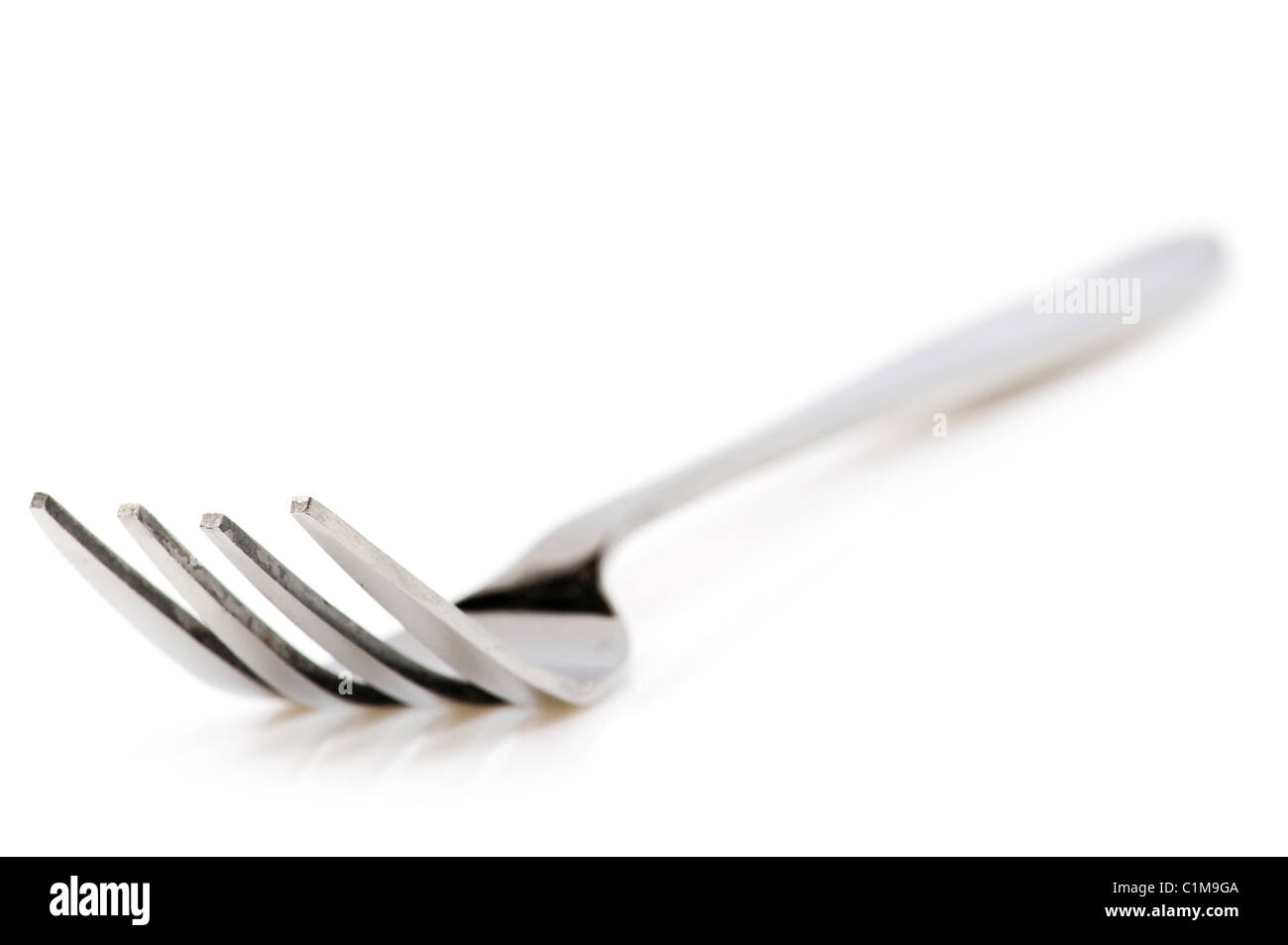 object on white - kitchen utensil fork Stock Photo - Alamy