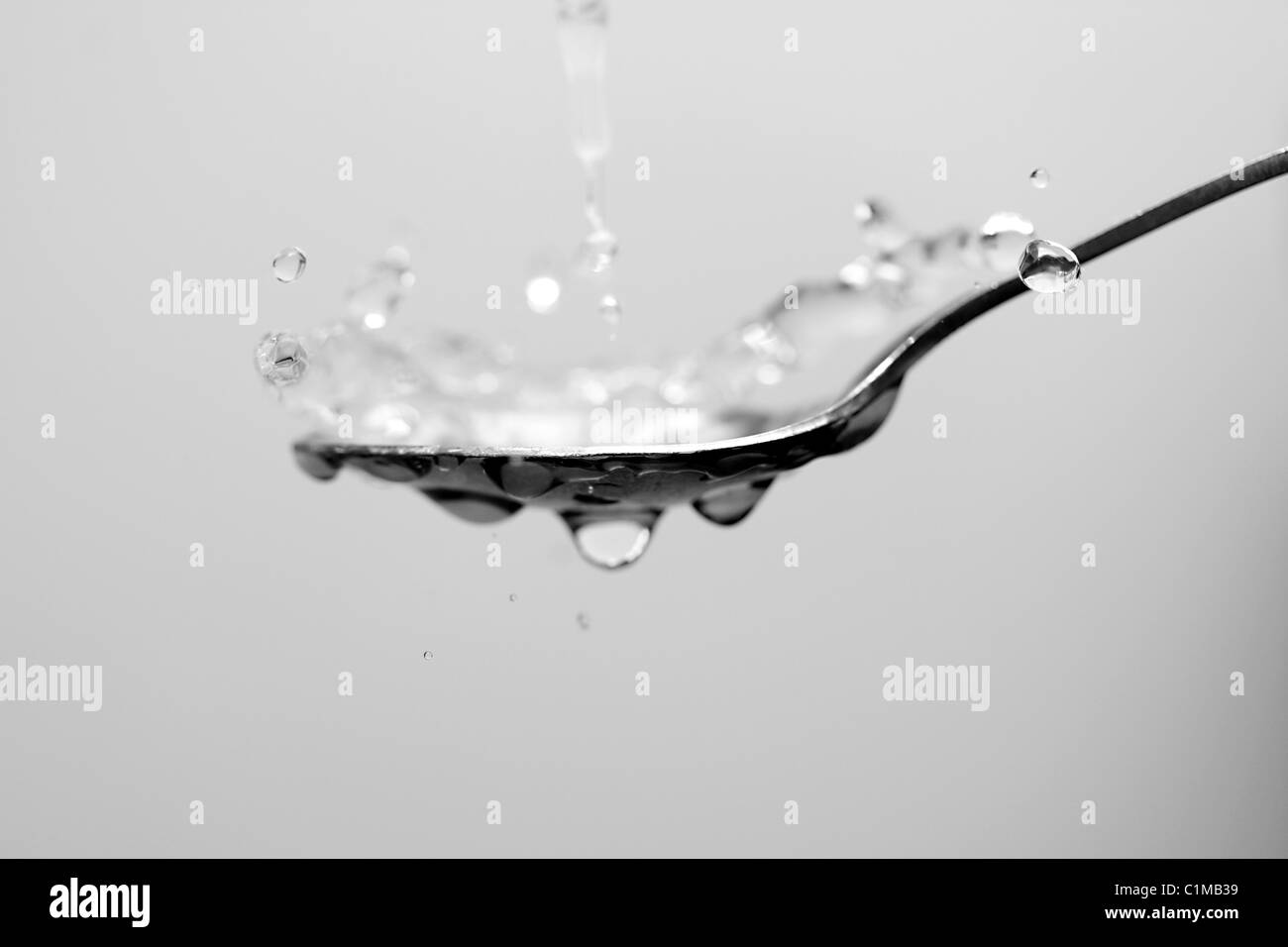 Water with spoon hi-res stock photography and images - Alamy