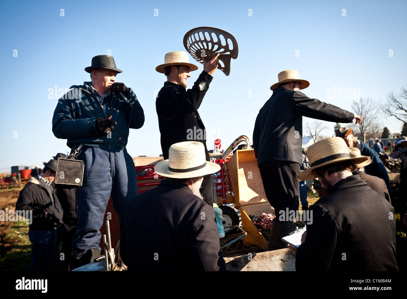 Amish auctioneers during the Annual Mud Sale to support the Fire ...