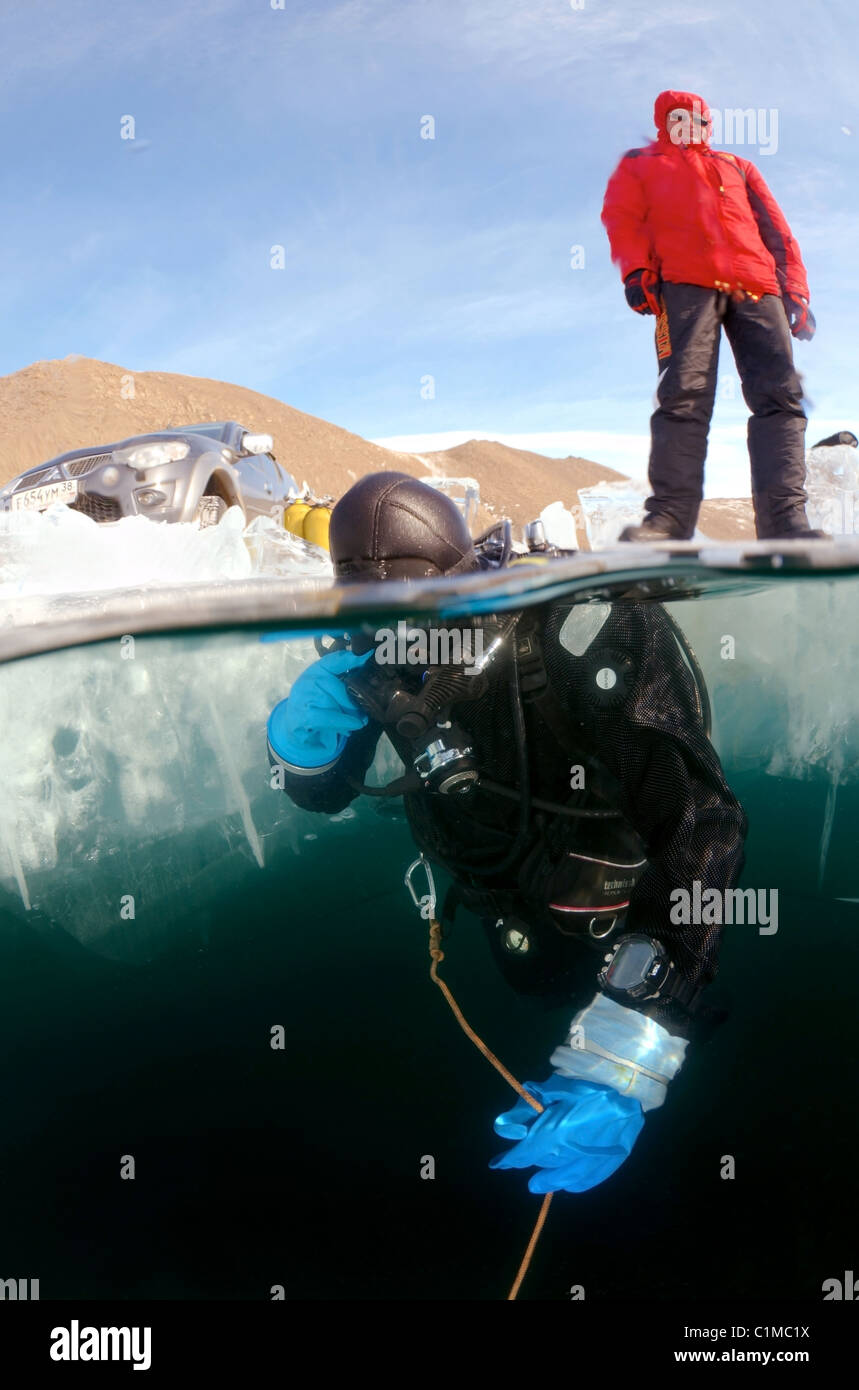 Underewater split level, ice-diving in lake Baikal, Siberia, Russia ...