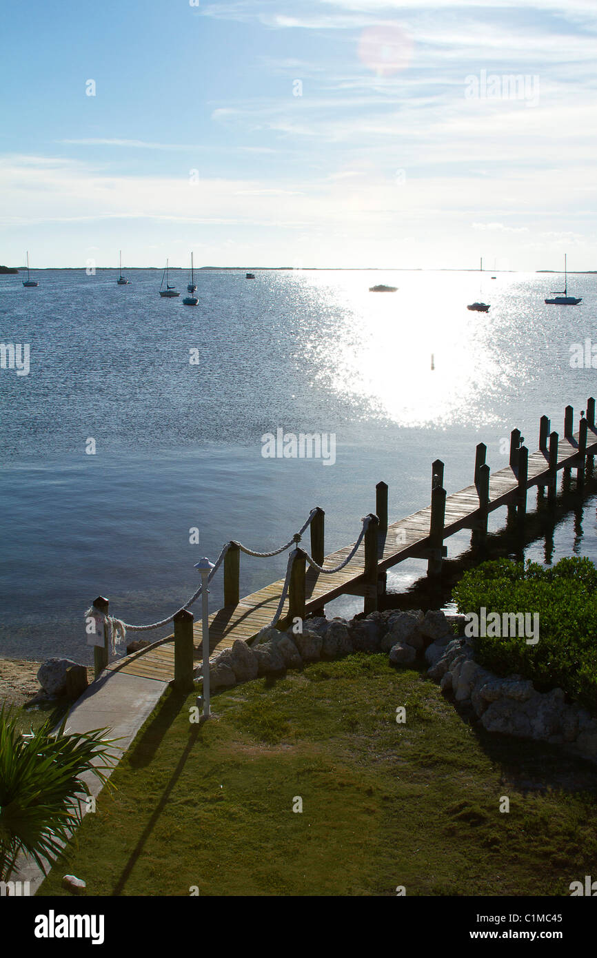Sailboats at sunset Stock Photo - Alamy