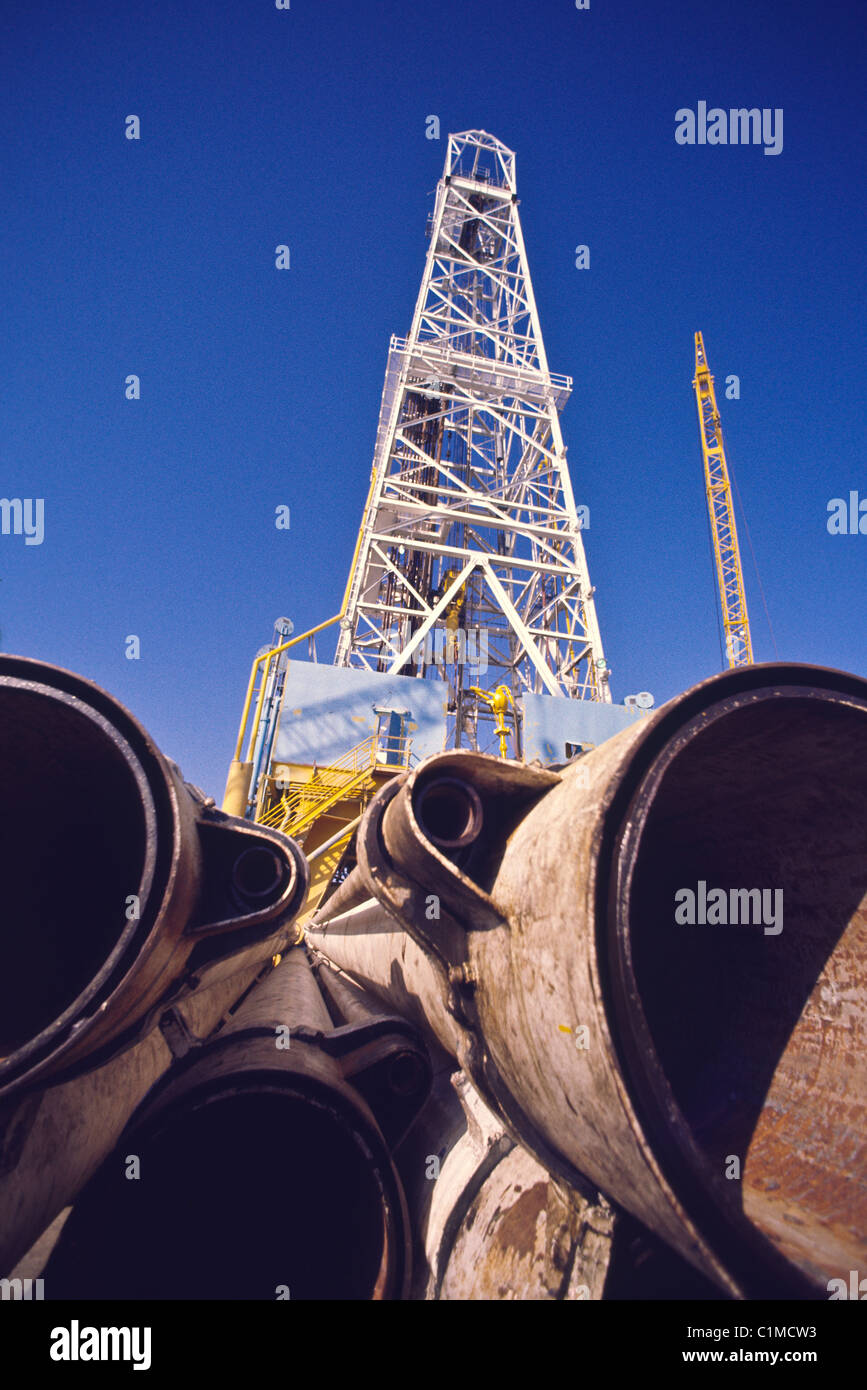Low angle view of offshore oil rig from drill pipe deck floor in Gulf ...
