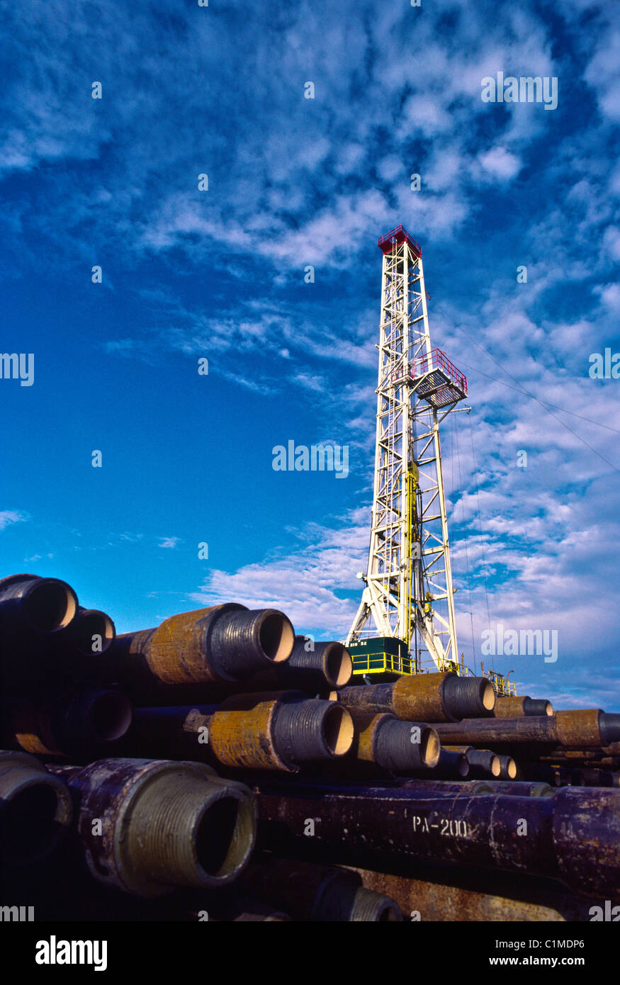 Low angle view of drilling rig from drill pipe or drill stem stack ...