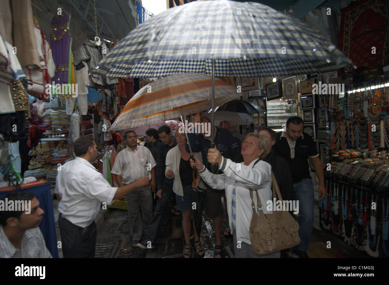 Tunisia tunis rain on tourists hi-res stock photography and images - Alamy