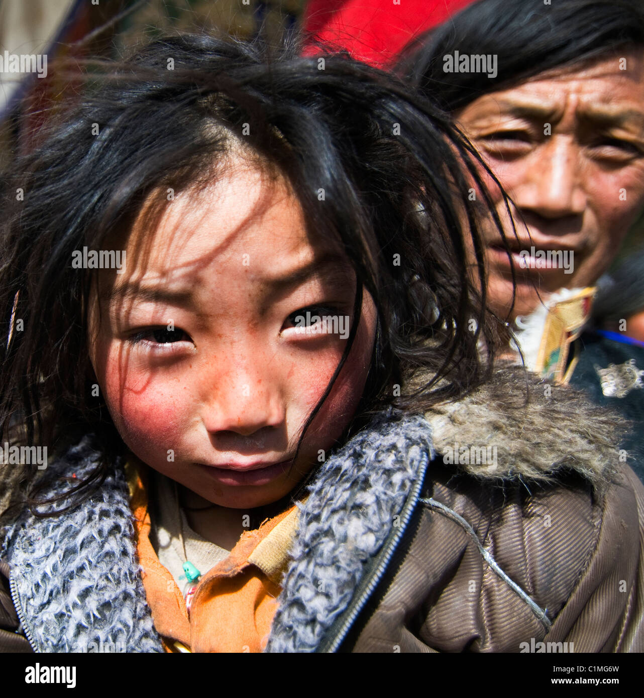 Faces of Tibet Stock Photo - Alamy