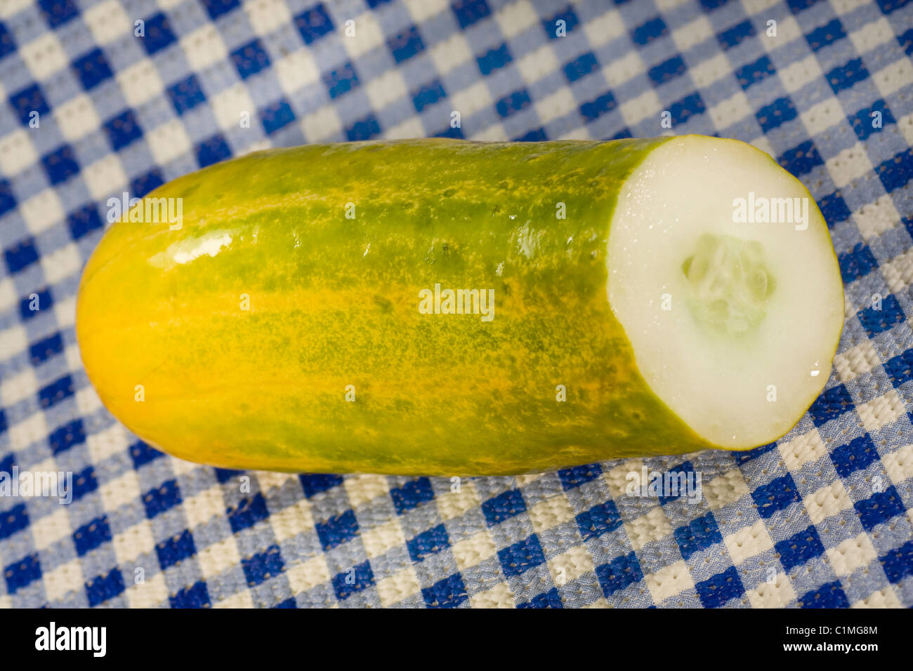 Piece of sliced cucumber vegetable isolated on the kitchen table Stock ...