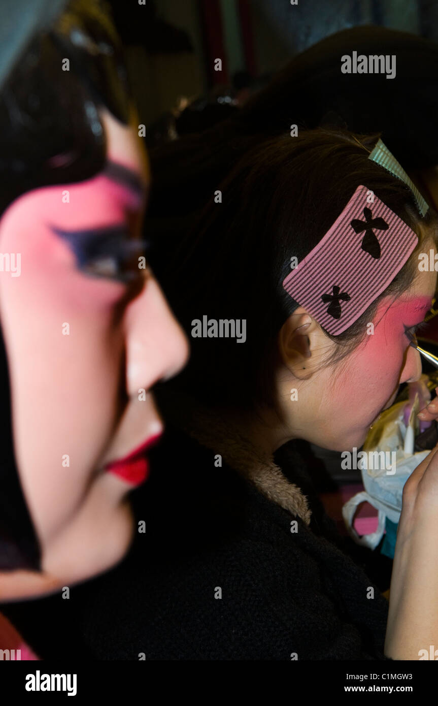 Beijing opera artist putting up their makeup in the dressing room Stock ...