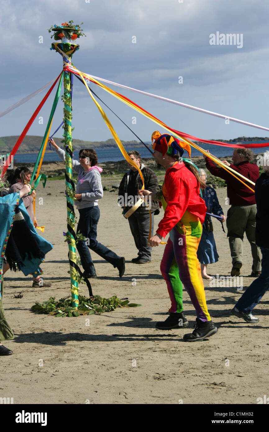 Dancing Around the Maypole. An Ancient Pagan Fertility Celebration ...