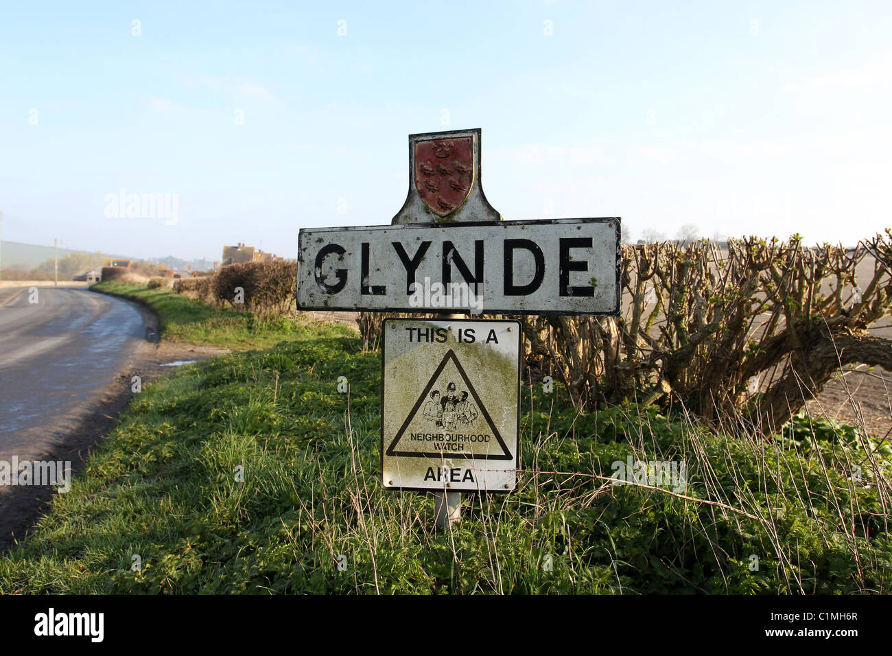 Glynde village sign above a neighbourhood watch area sign in Glynde ...