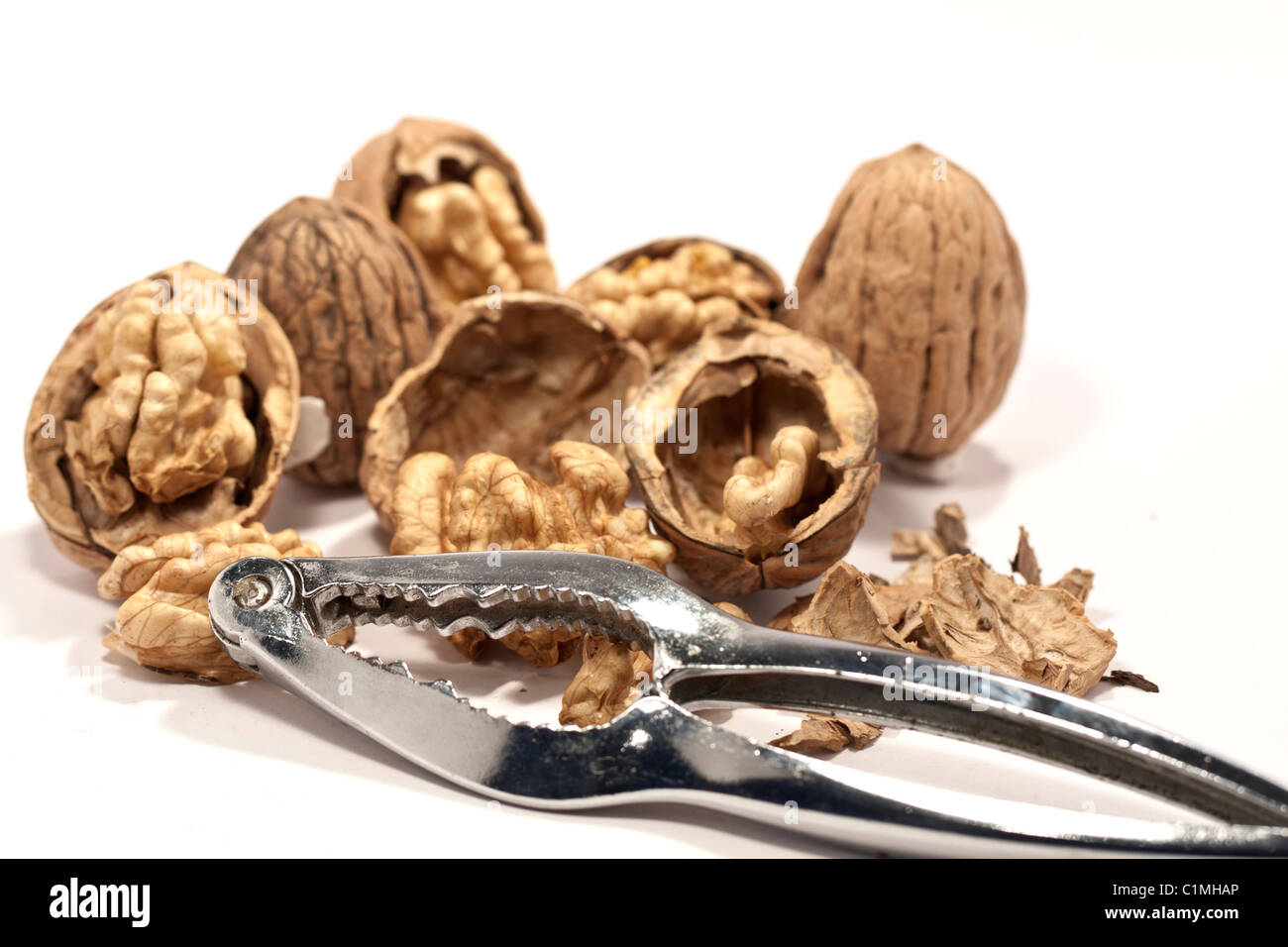 close view detail of some walnuts isolated on a white background Stock ...