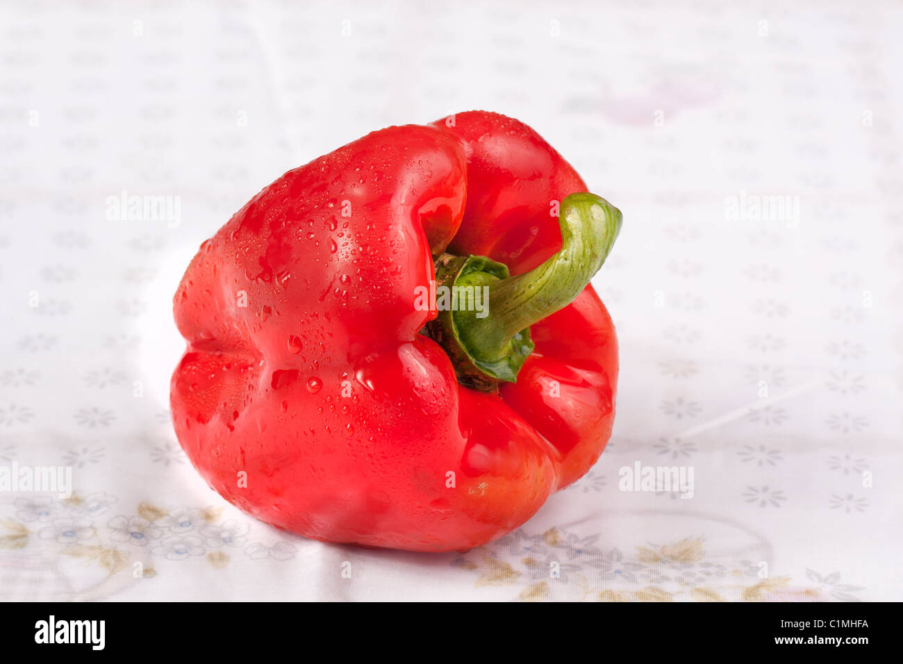 Close view of a isolated red bell pepper on a white background Stock ...