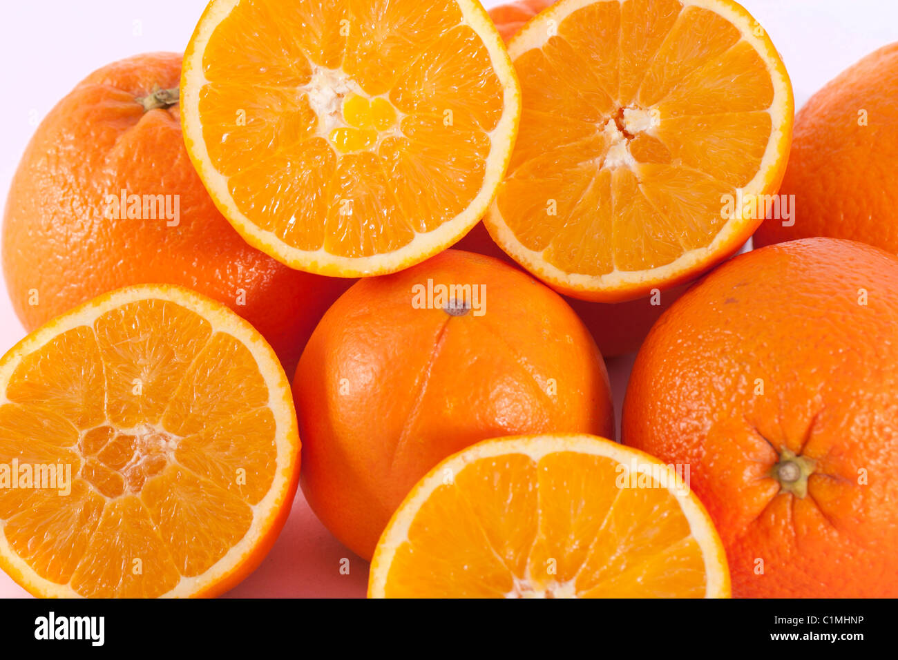 Detail view of a bunch of oranges isolated on a white background Stock ...