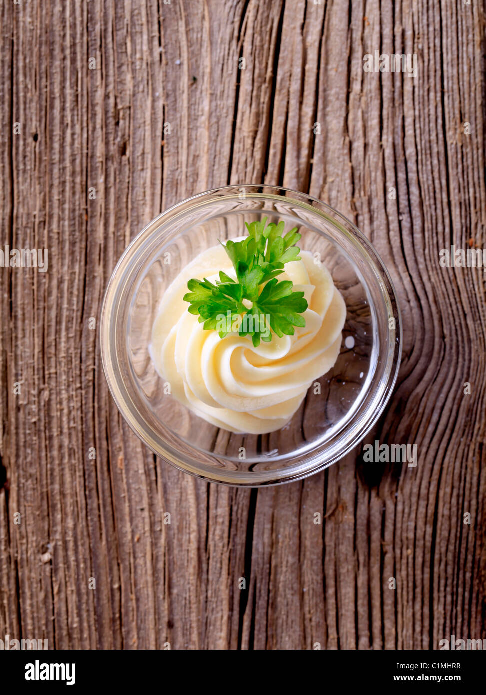 Swirl of fresh butter in a glass dish Stock Photo - Alamy