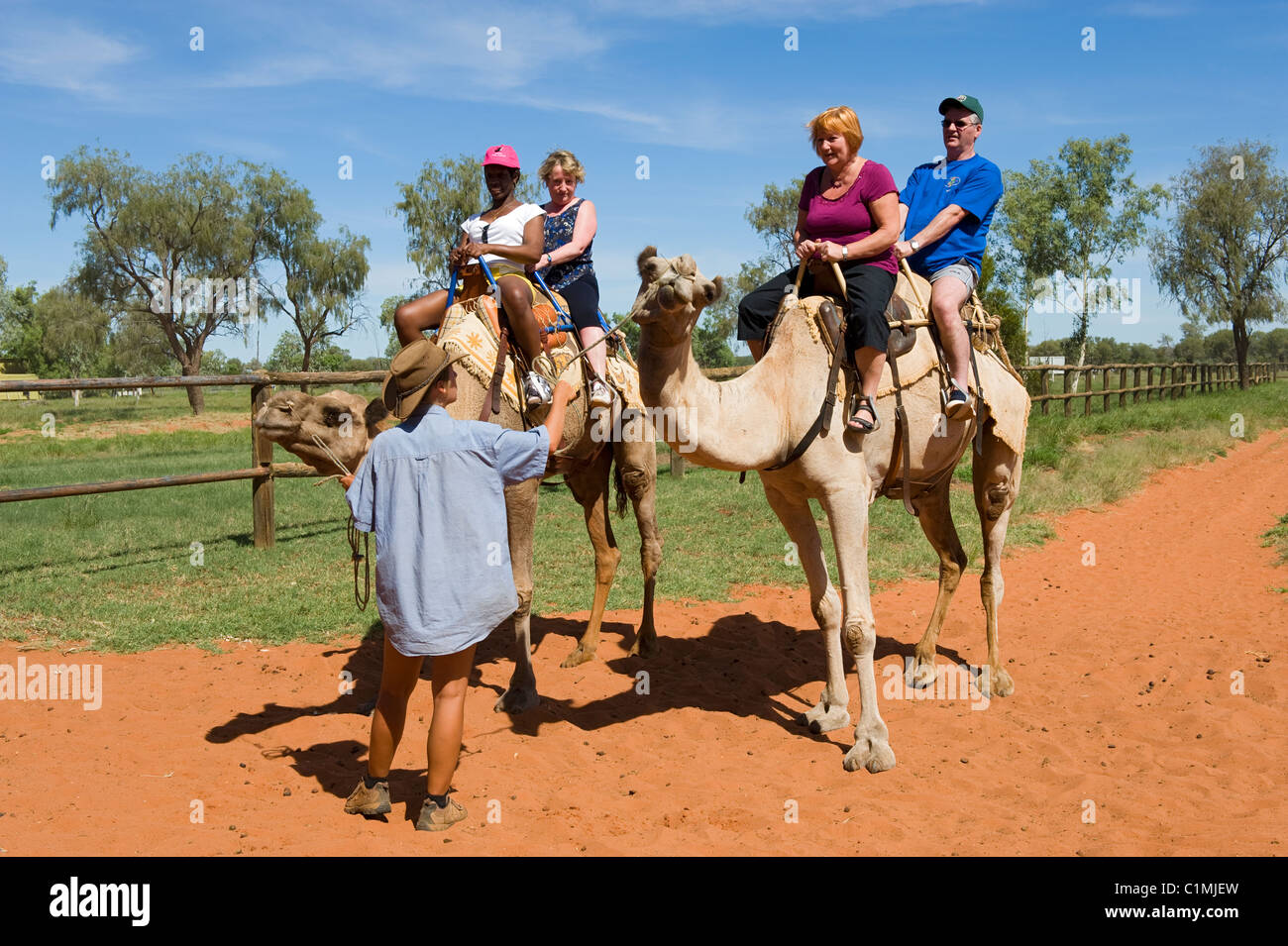 Woman riding camel hi-res stock photography and images - Alamy