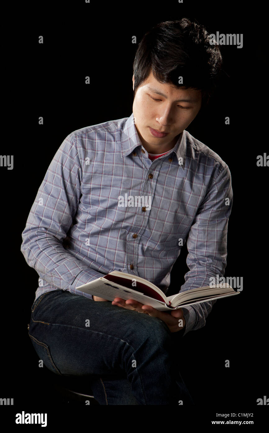 University student acting pose Stock Photo - Alamy