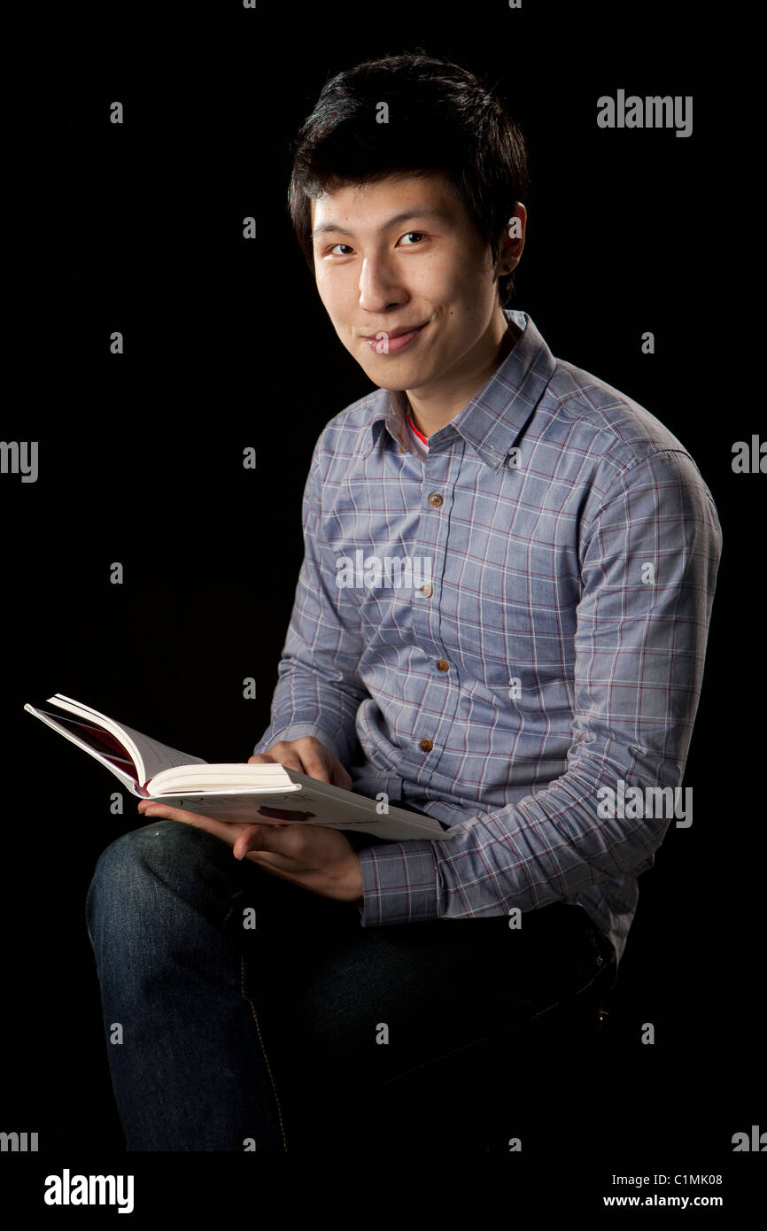 University student acting pose Stock Photo - Alamy