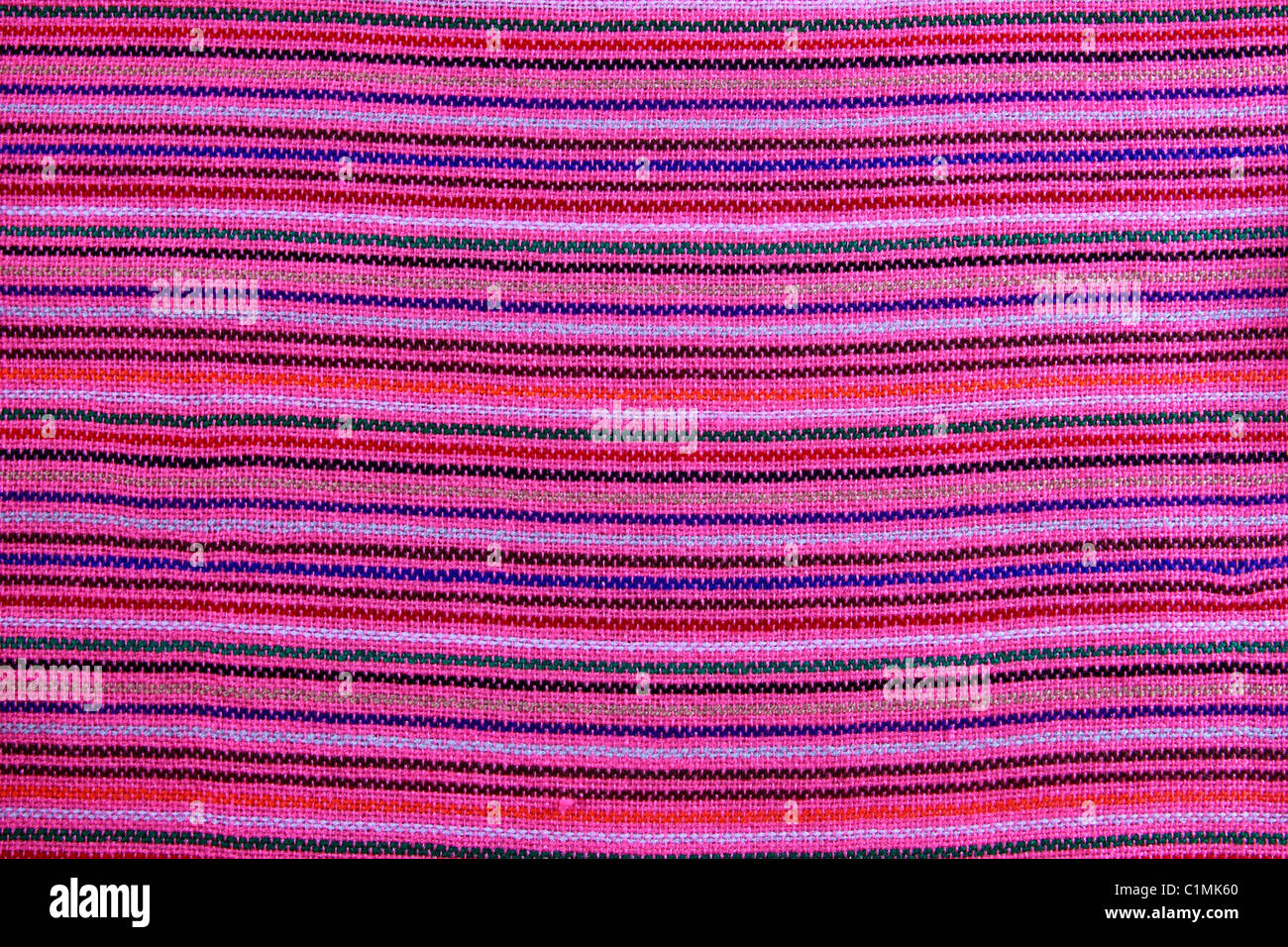 Mexican serape vibrant pink macro fabric texture background Stock Photo ...