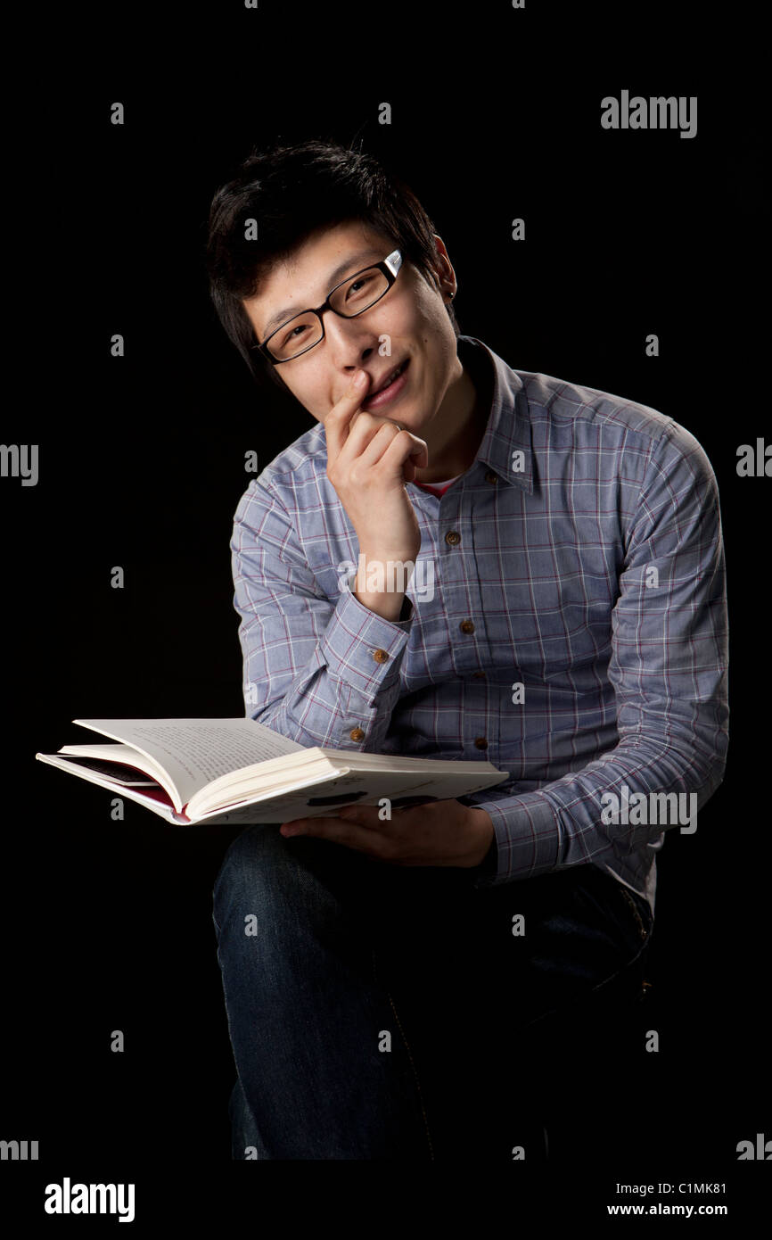 University student acting pose Stock Photo - Alamy