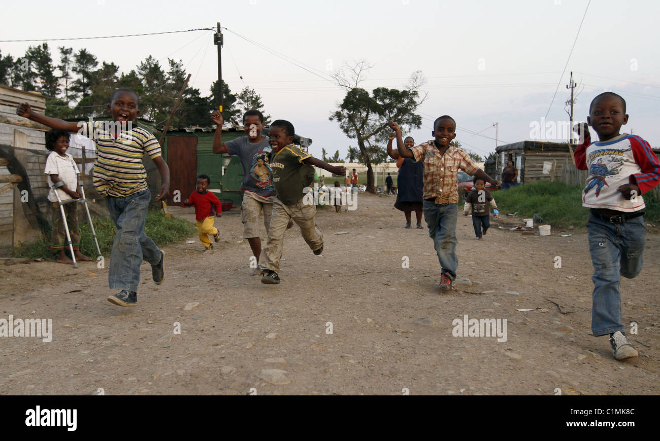 African boys running kwanokuthula township hi-res stock photography and ...