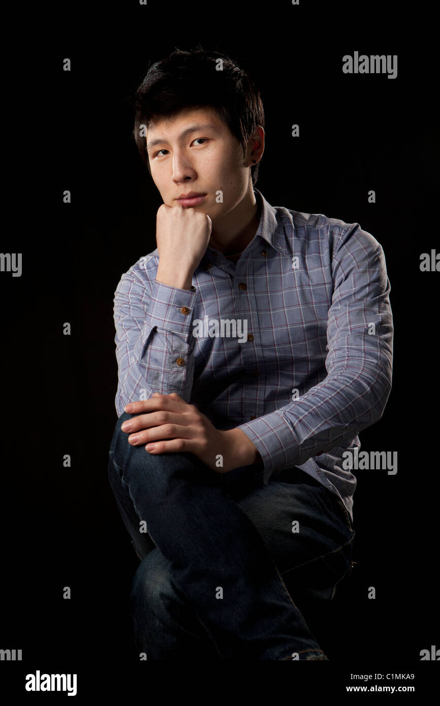 University student acting pose Stock Photo - Alamy