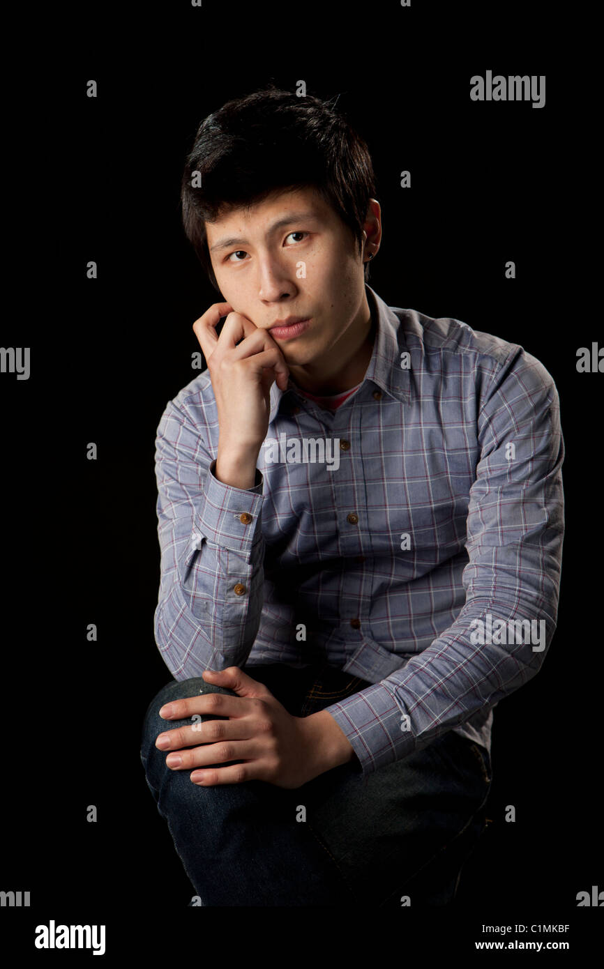 University student acting pose Stock Photo - Alamy
