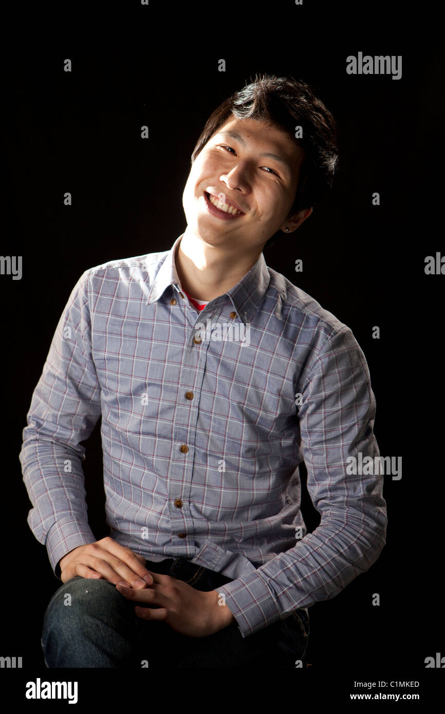 University student acting pose Stock Photo - Alamy