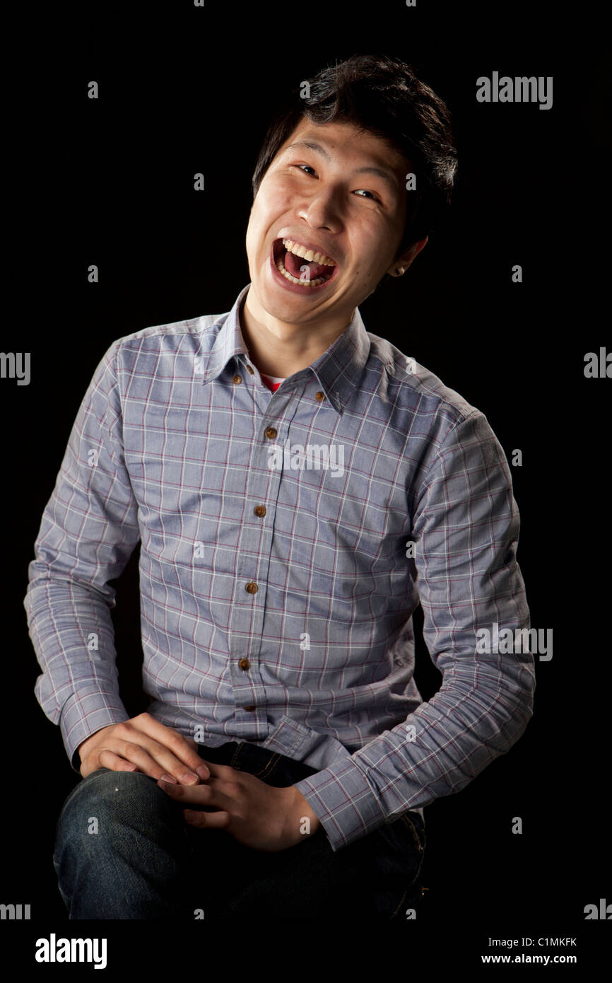 University student acting pose Stock Photo - Alamy