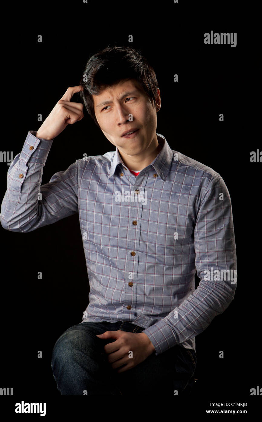 University student acting pose Stock Photo - Alamy