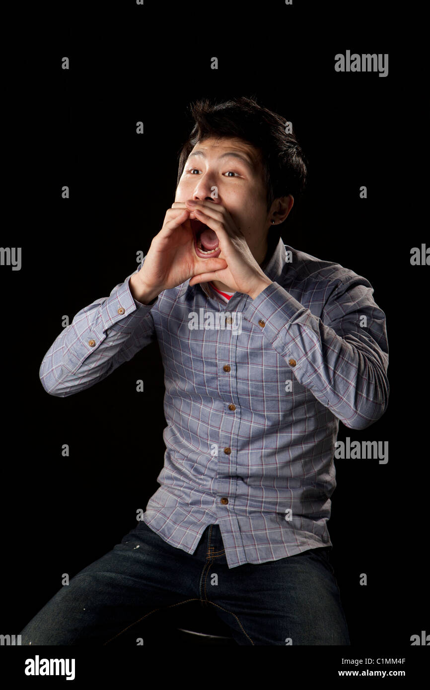 University student acting pose Stock Photo - Alamy