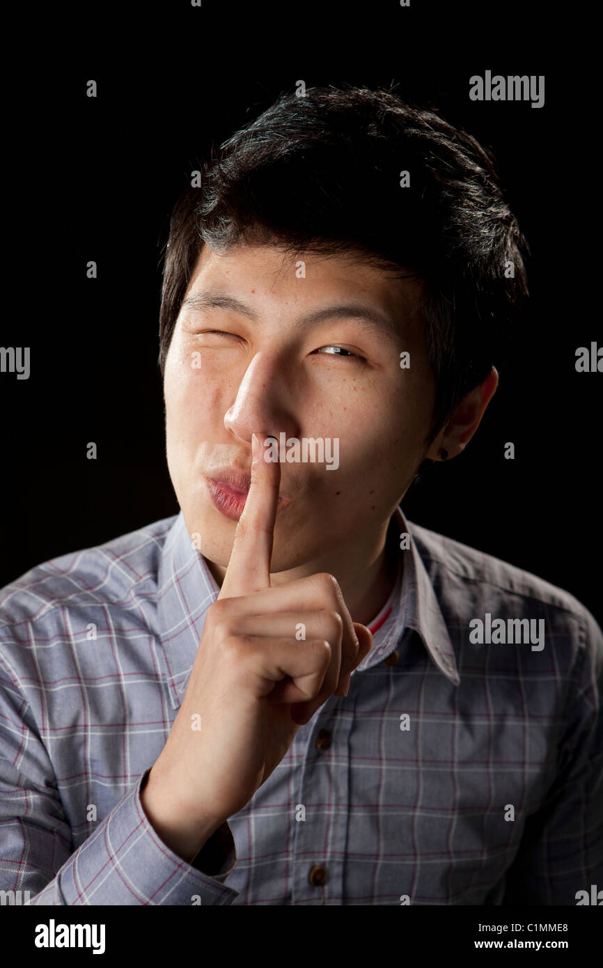 University student acting pose Stock Photo - Alamy