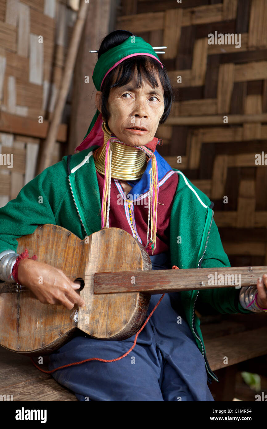 Karen Long Neck hill tirbes woman playing instrument like guitar, Huay ...