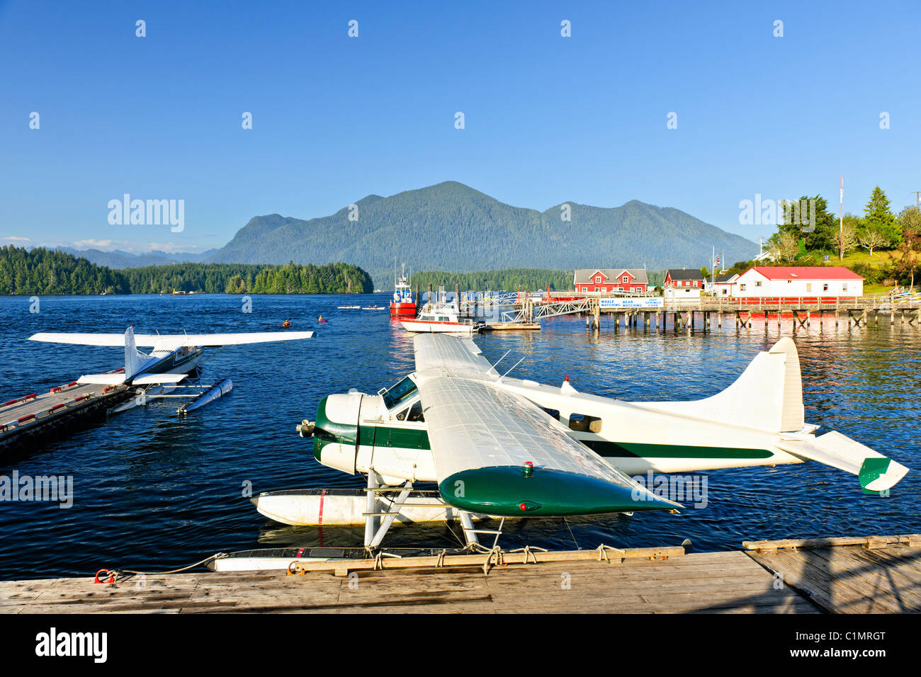 Seaplanes at dock in Tofino on Pacific coast of British Columbia ...
