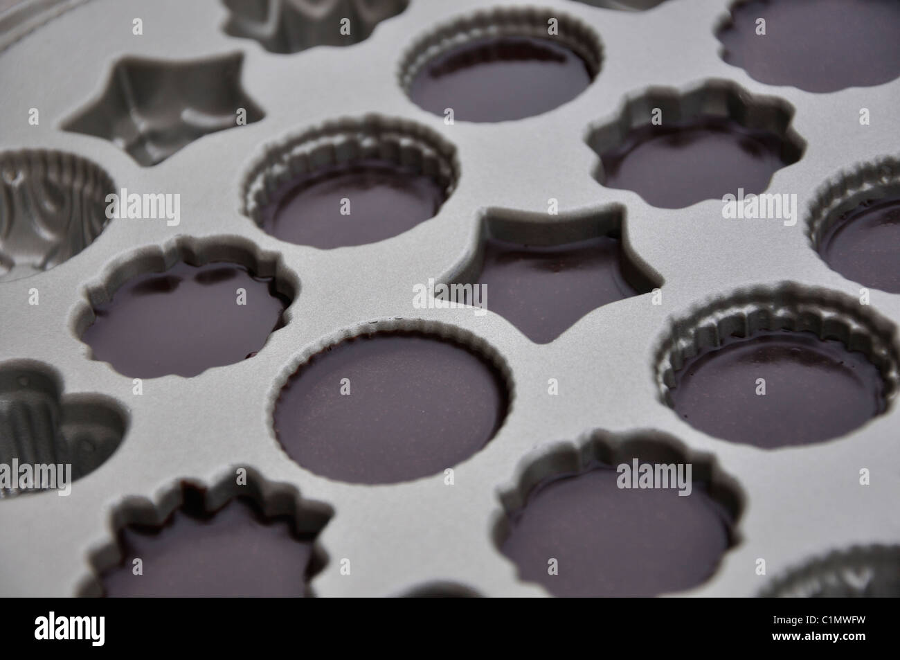 Process making chocolate chocolates hi-res stock photography and images ...