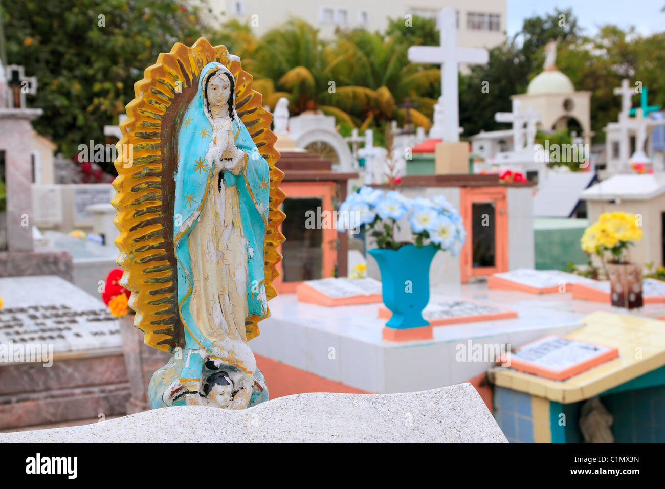 Caribbean cemetery catholic angel saints figures colorful Mexico Stock ...