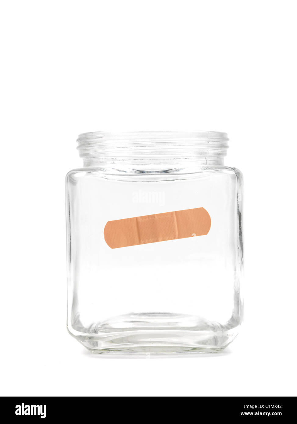 An empty jar with a blank labelisolated against a white background ...
