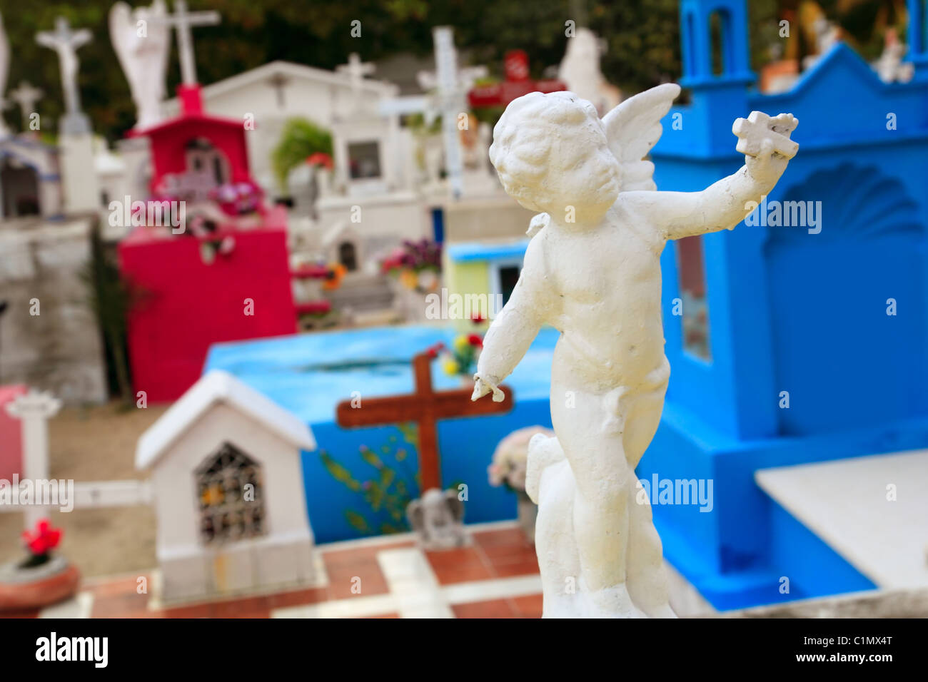 Caribbean children cemetery catholic angel saints figures colorful ...