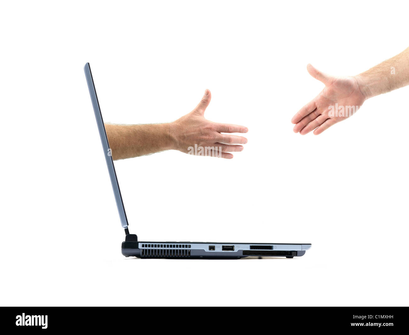 Male hands forming a handshake out of a laptopisolated against a white ...