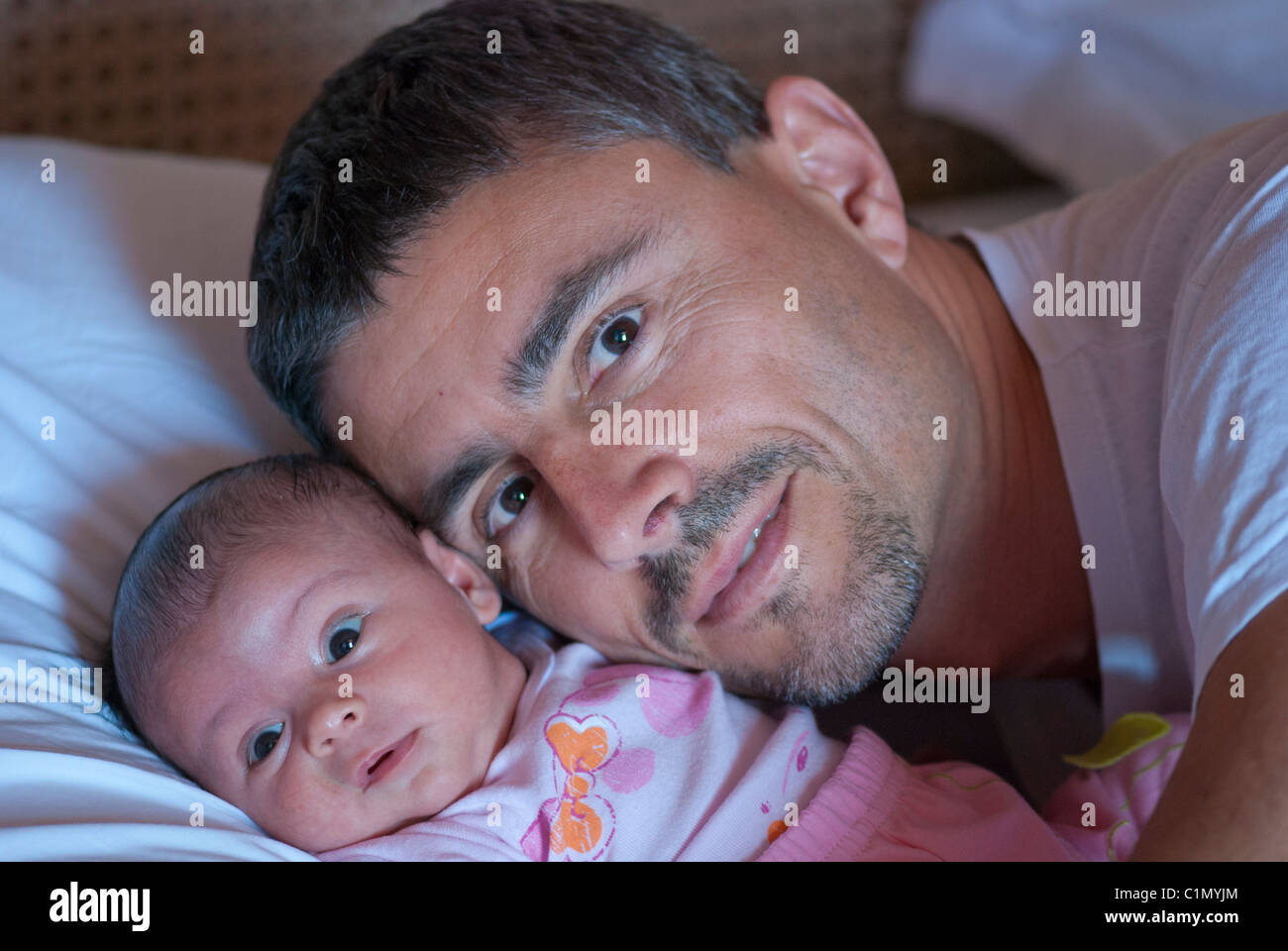 Father's Protection Behavior for his Newborn Daughter Stock Photo - Alamy