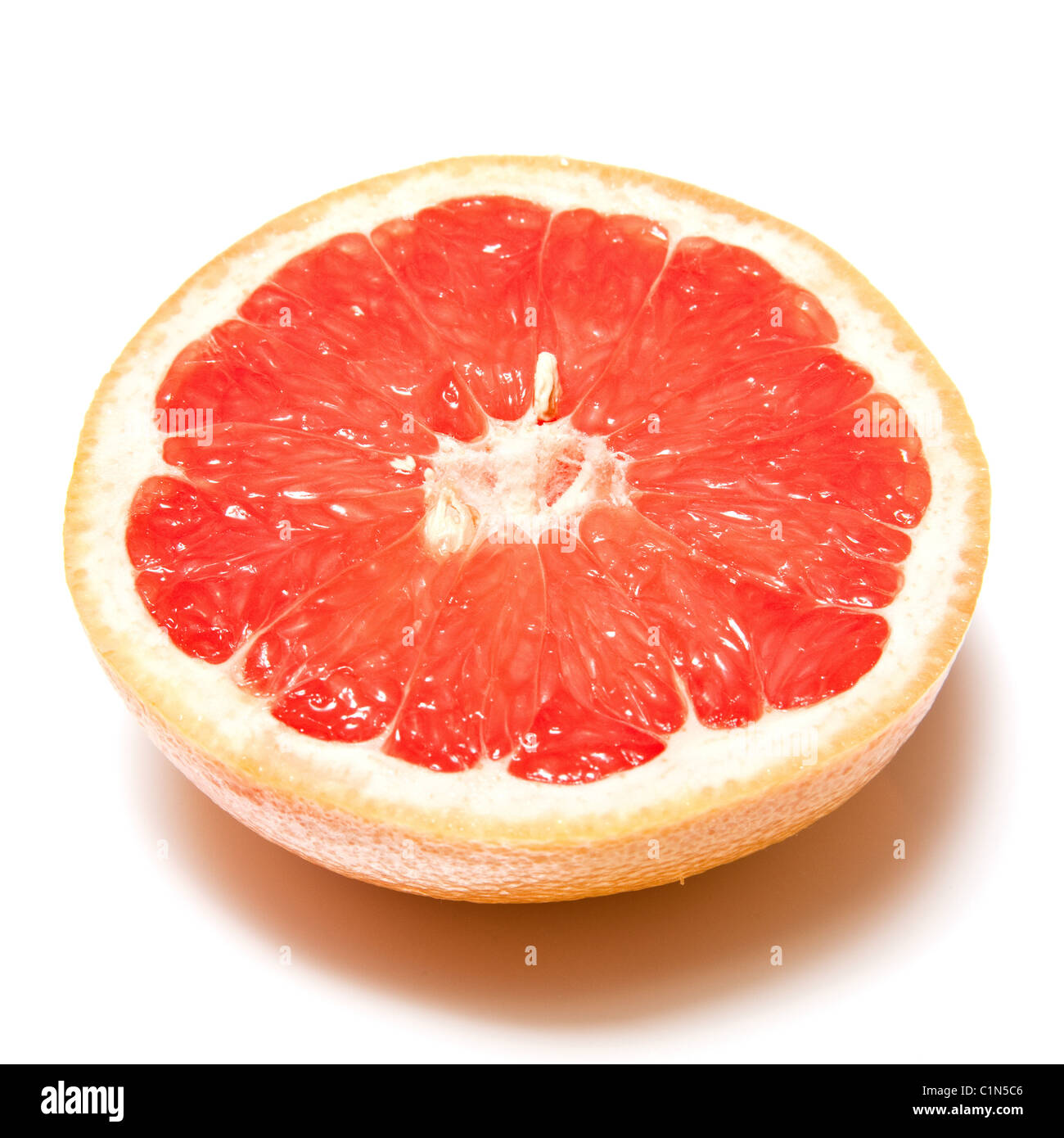 Blood or red grapefruit isolated on a white studio background Stock ...
