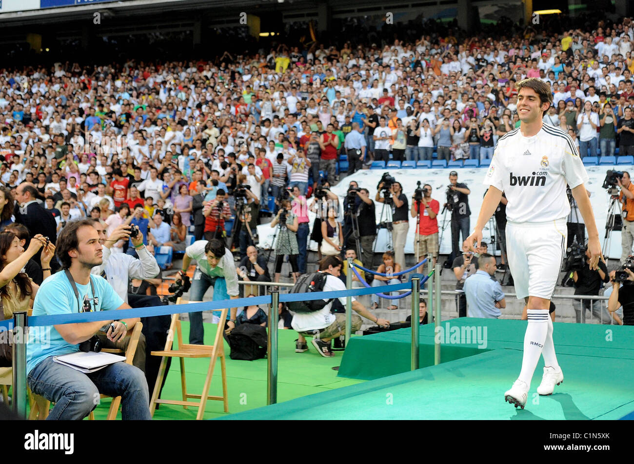 Kaka is greeted by 50,000 fans at the Bernabeu Stadium as he is ...