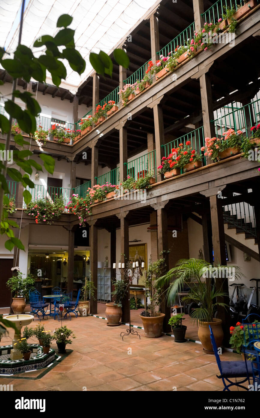 Interior / internal courtyard with balcony / balconies & room doors at ...