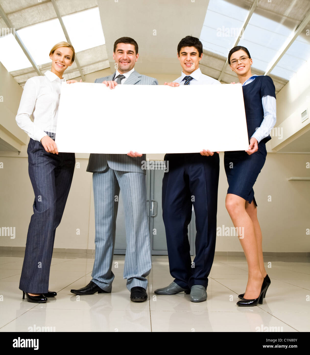 Portrait of business people promoting something Stock Photo - Alamy