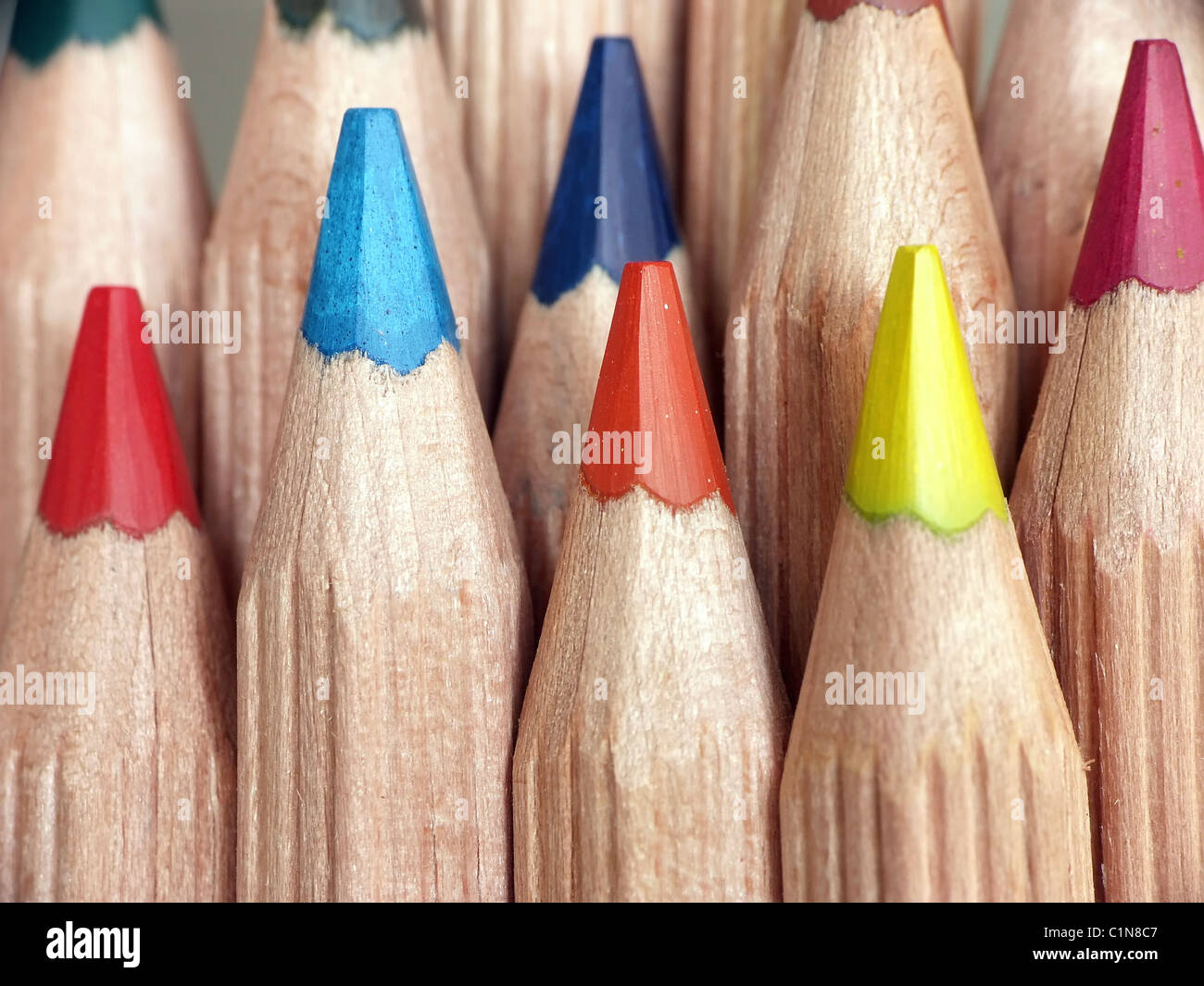 Rows of colorful wooden crayons Stock Photo - Alamy