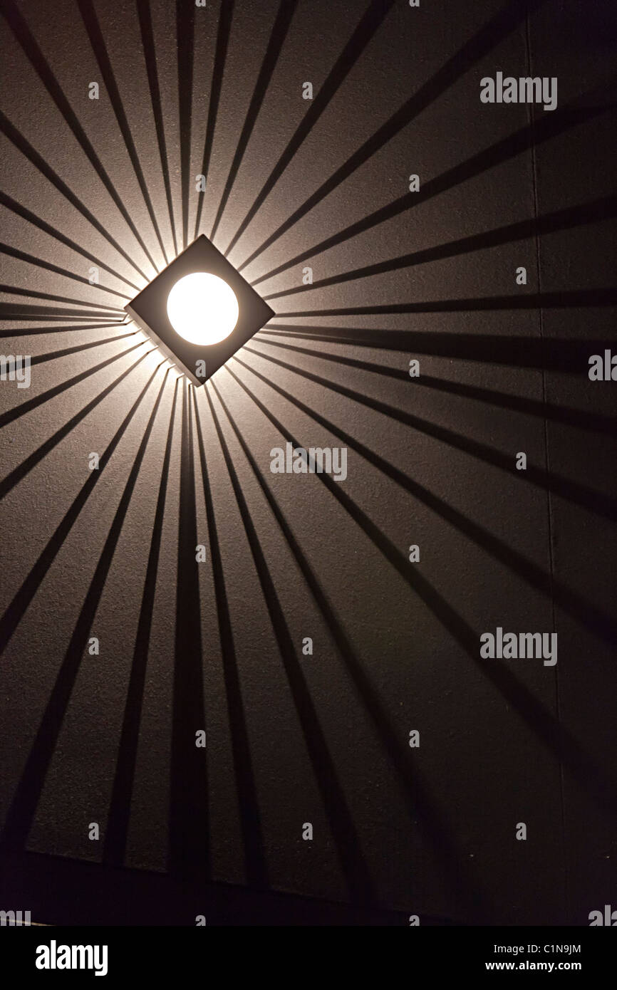 Light casting shadows on wall cinema auditorium UK Stock Photo - Alamy