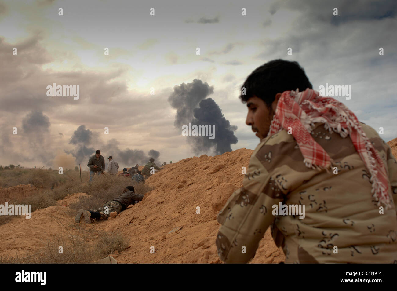 Heavy fighting near airfield at Ras Lanuf Stock Photo - Alamy