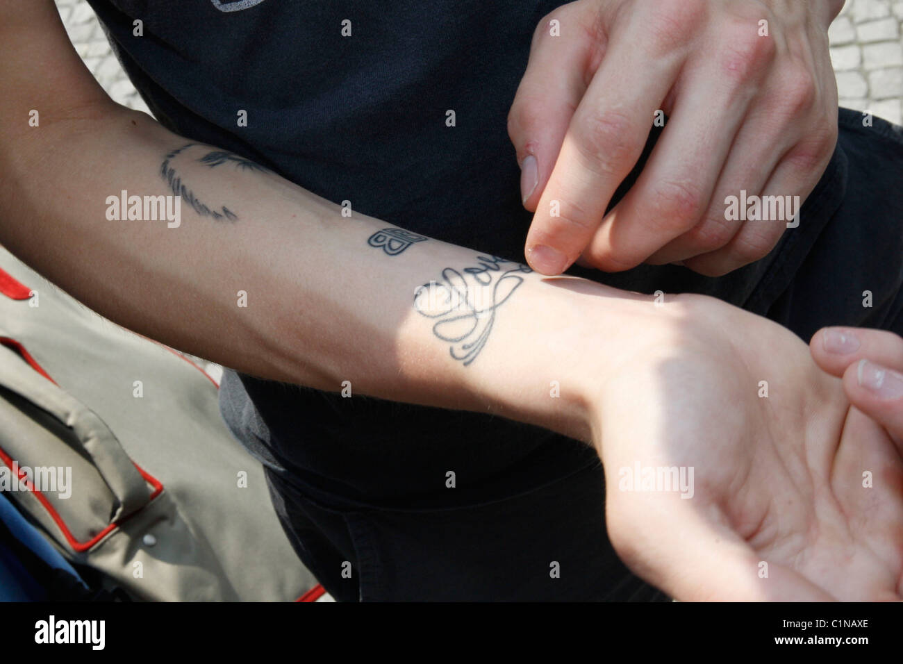 Luke Worrell's tattoos outside the fashion tent at Bebelplatz Mercedes ...